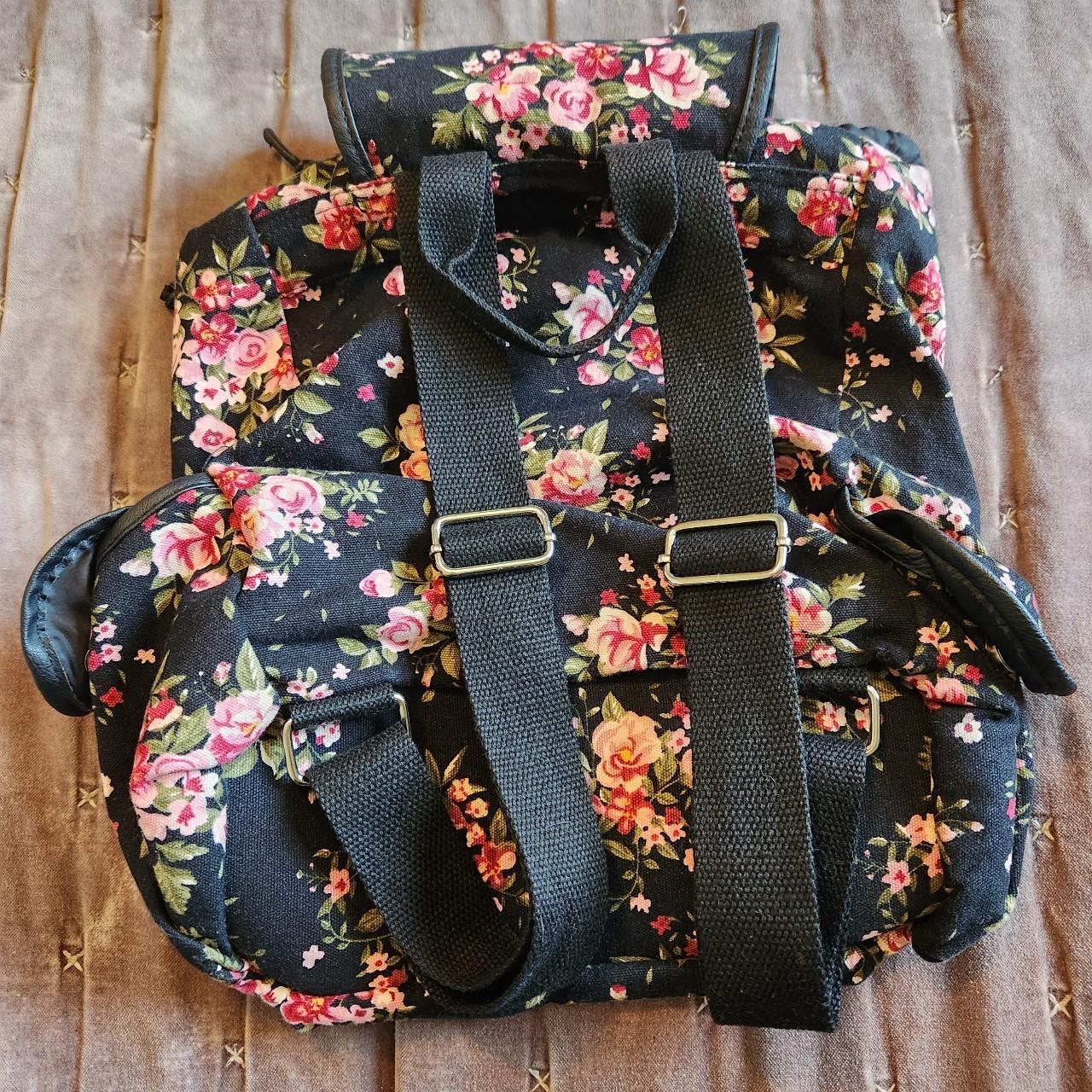 Black floral slouch backpack. Feels like a soft... - Depop