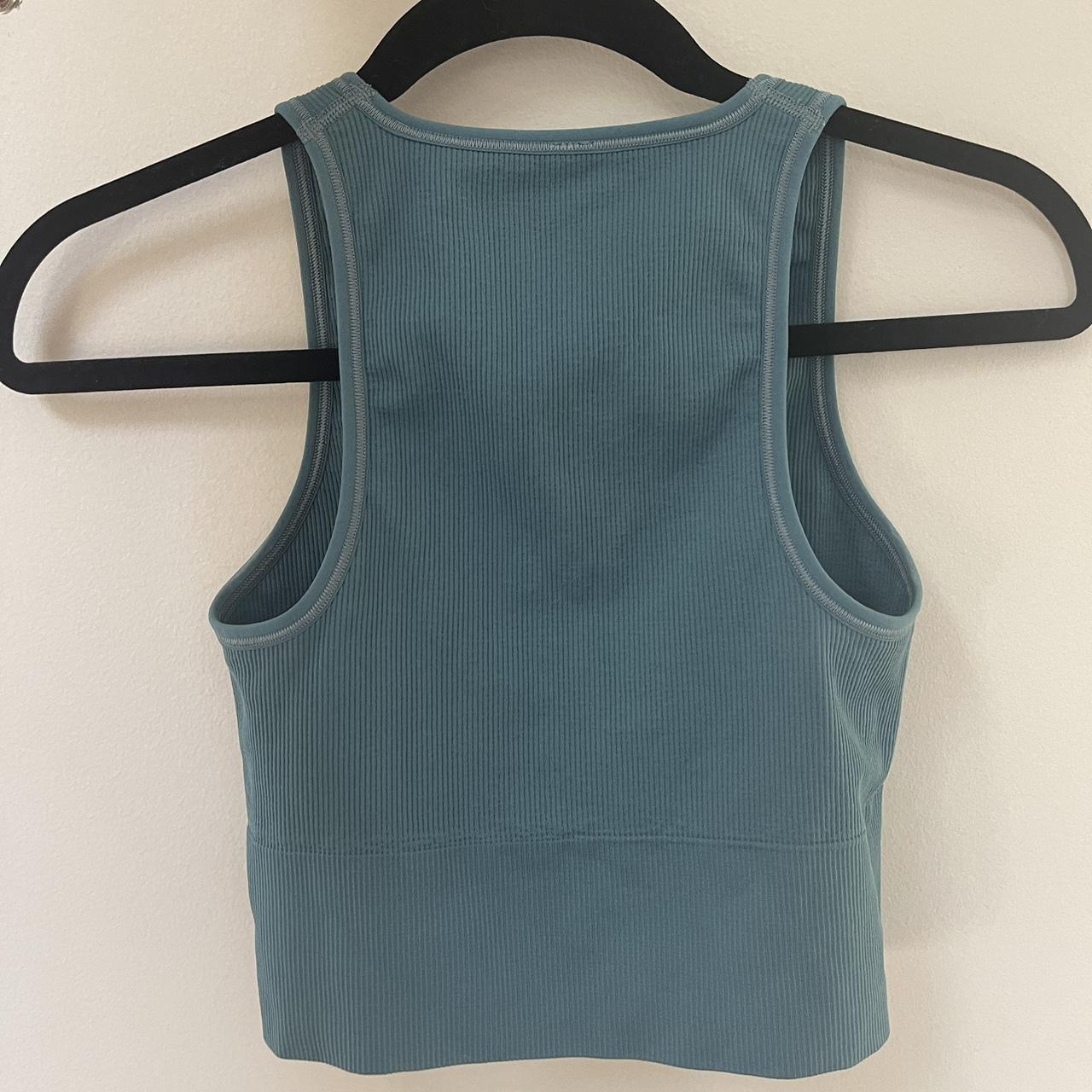 TEAL V CUT TANK like new condition size SMALL - Depop