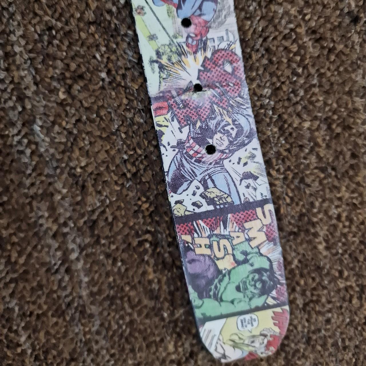 Marvel mens leather comic strip belt with a gunmetal... - Depop