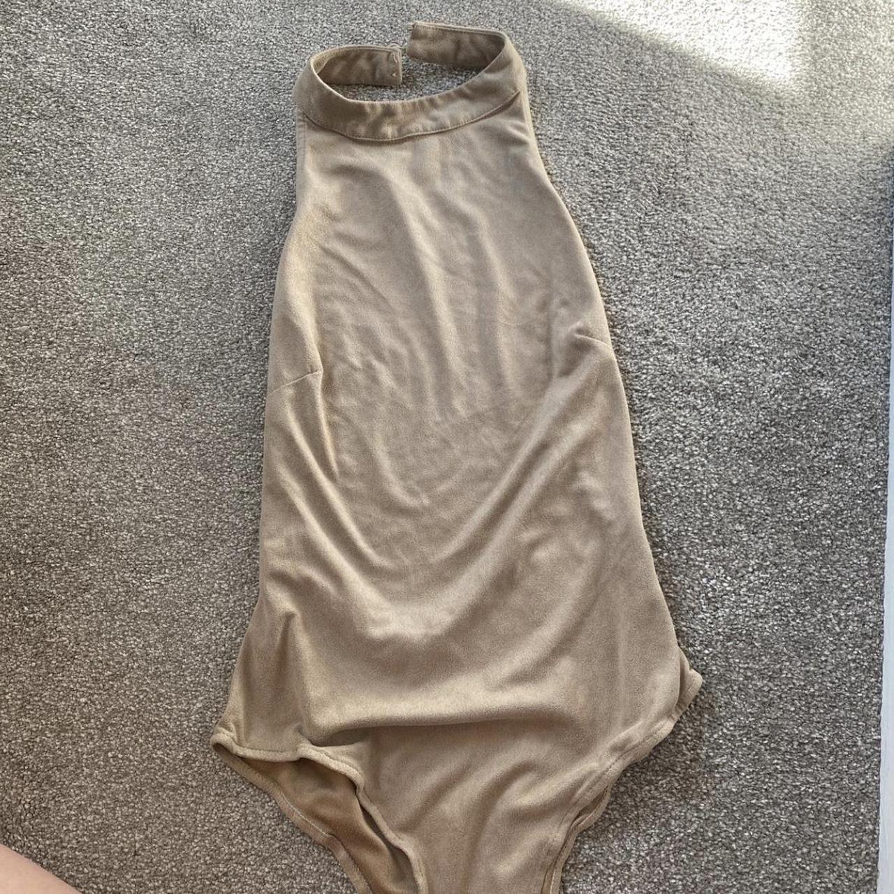 Really cute tan bodysuit, halter neck with buttons... - Depop