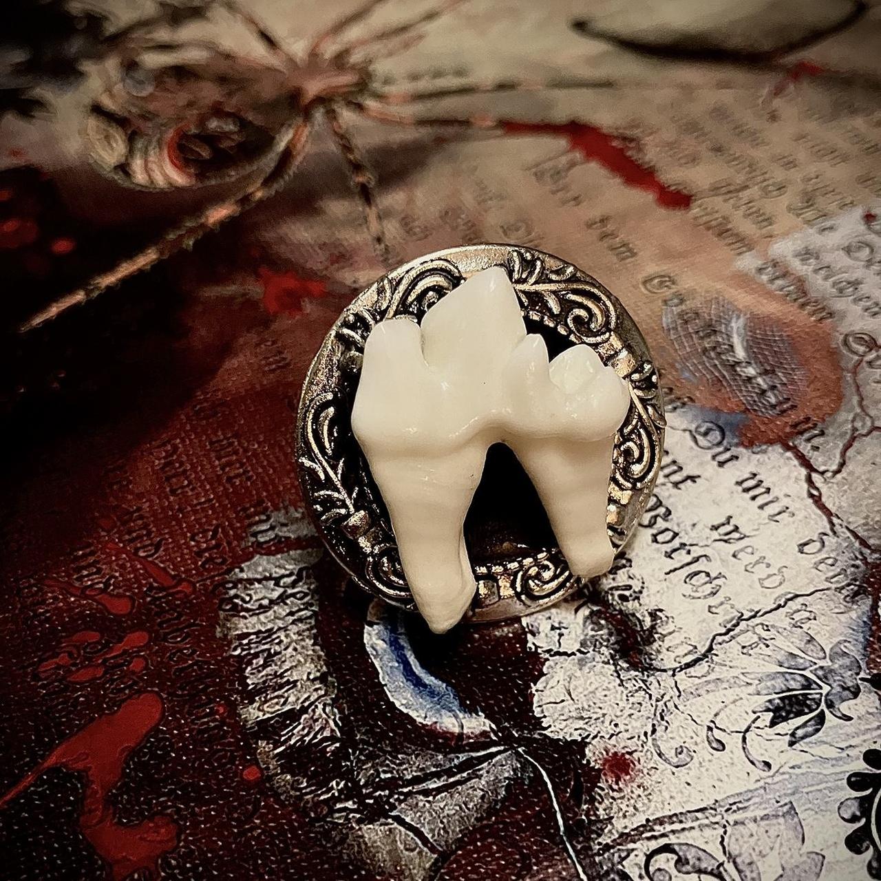 Coyote molar ring. Handmade and set in black resin.... - Depop