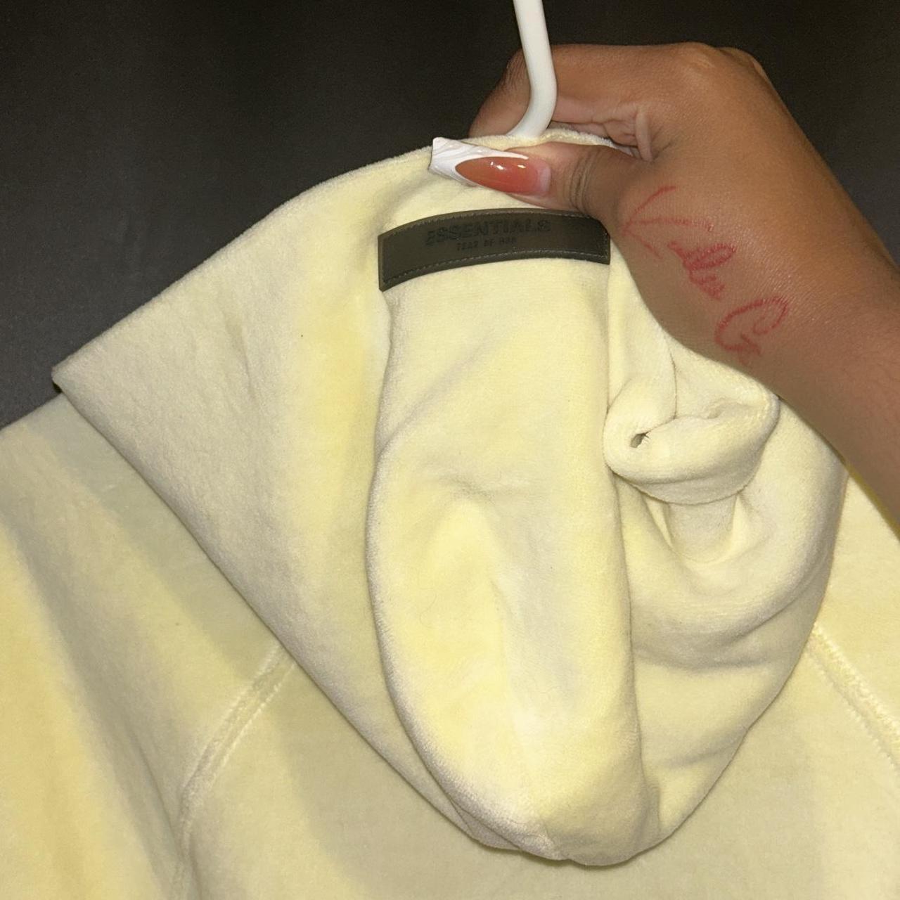 Fear of God ESSENTIALS Yellow Raglan Hoodie Never... - Depop