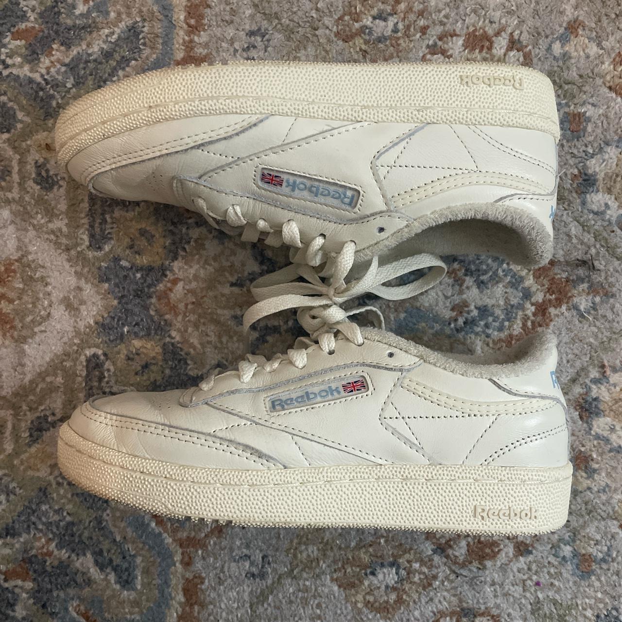 Size 4 White and blue Reebok! In good condition.... - Depop