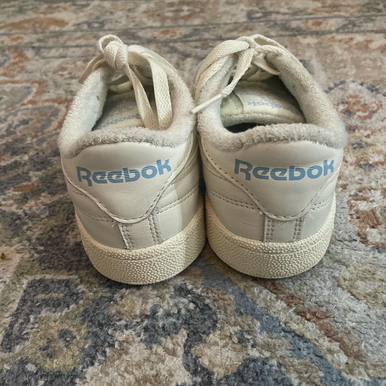 Size 4 White and blue Reebok! In good condition.... - Depop