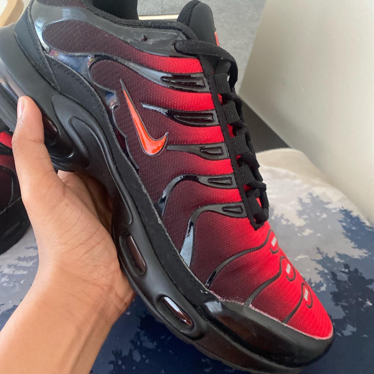 Nike Air Max Plus TN trainers in bold red and black... | Depop