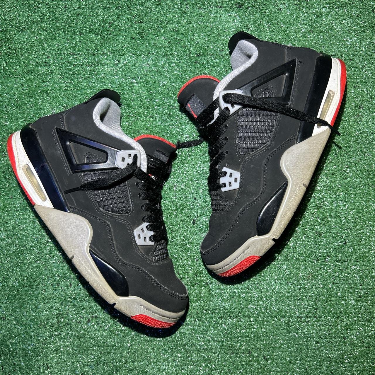 authentic jordan 4 bred solid condition, all flaws... - Depop