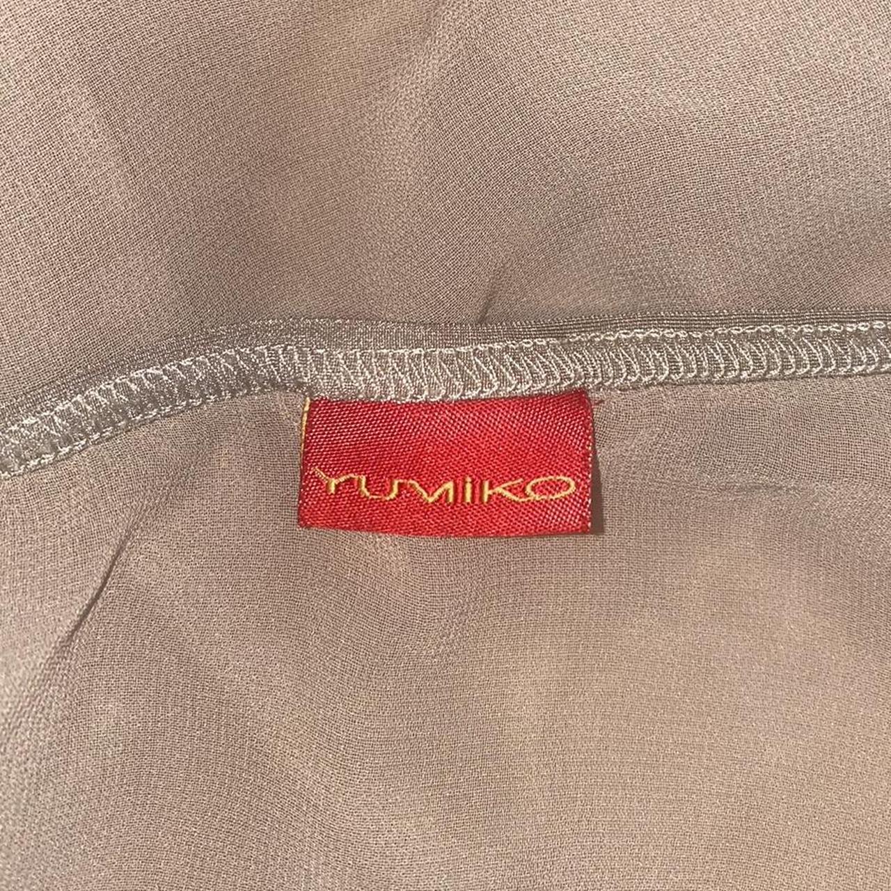 Yumiko Pat short wrap skirt tan/gold color... | Depop