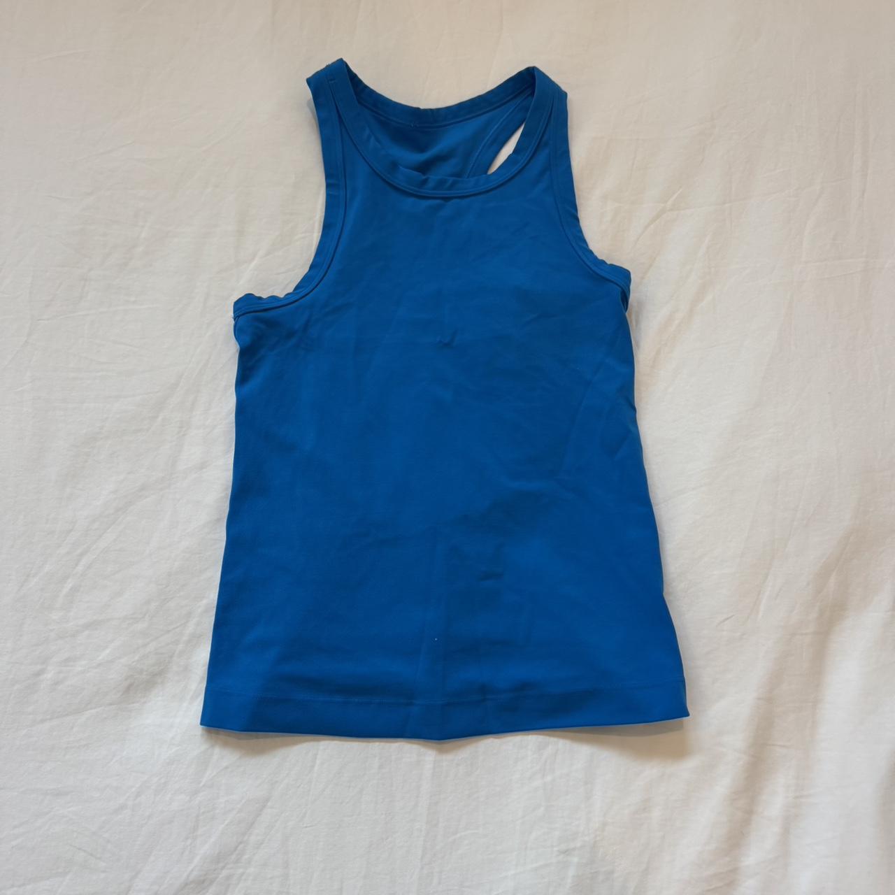 Lululemon blue racer back tank top Size 2 #lululemon... - Depop