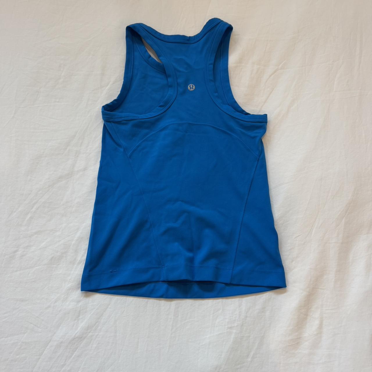 Lululemon blue racer back tank top Size 2 #lululemon... - Depop