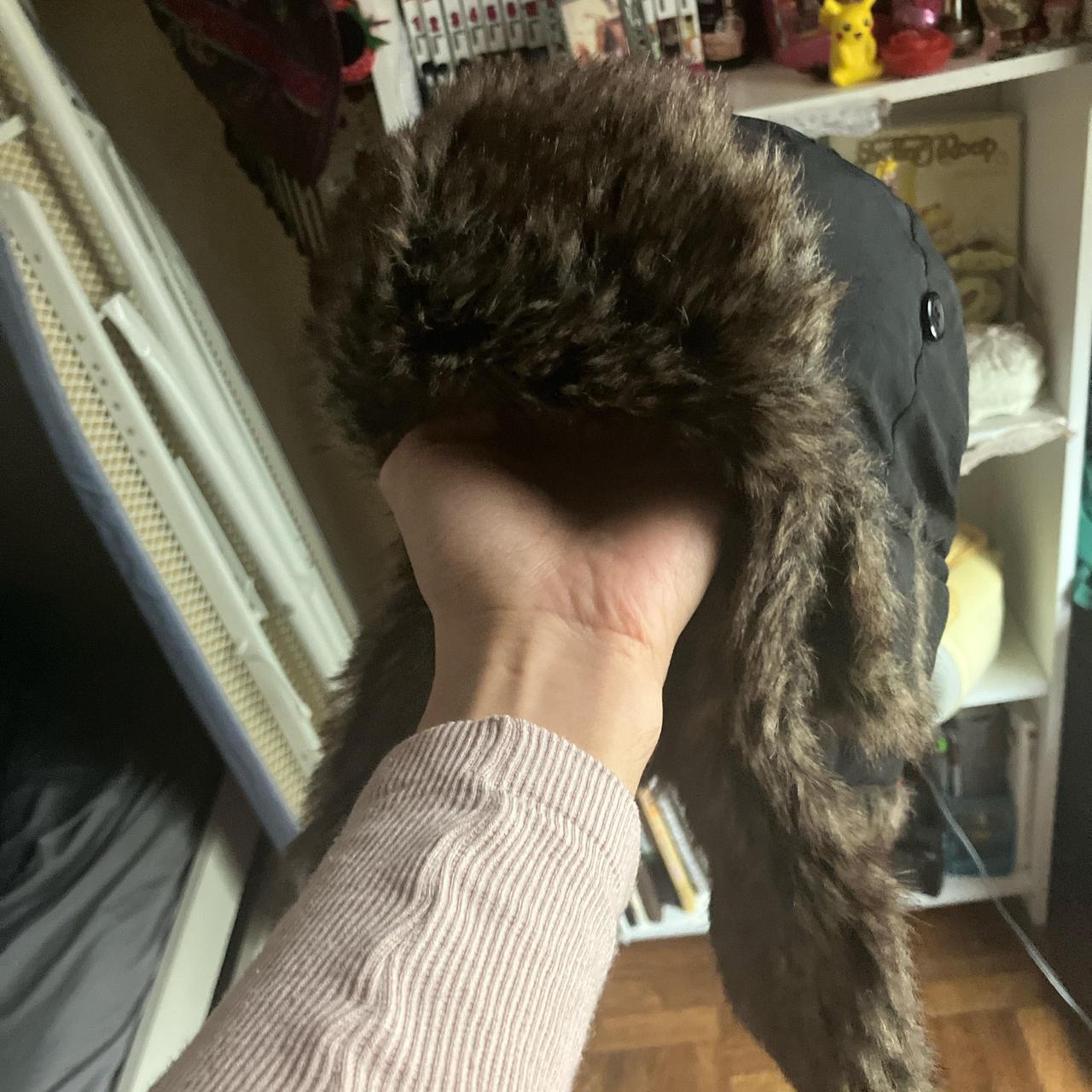 Black and brown fur trapper hat. Fits pretty small. | Depop