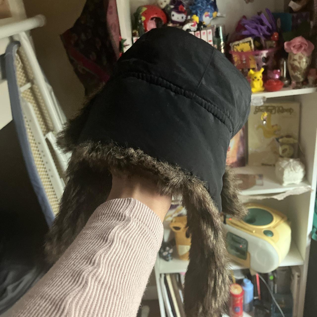 Black and brown fur trapper hat. Fits pretty small. | Depop