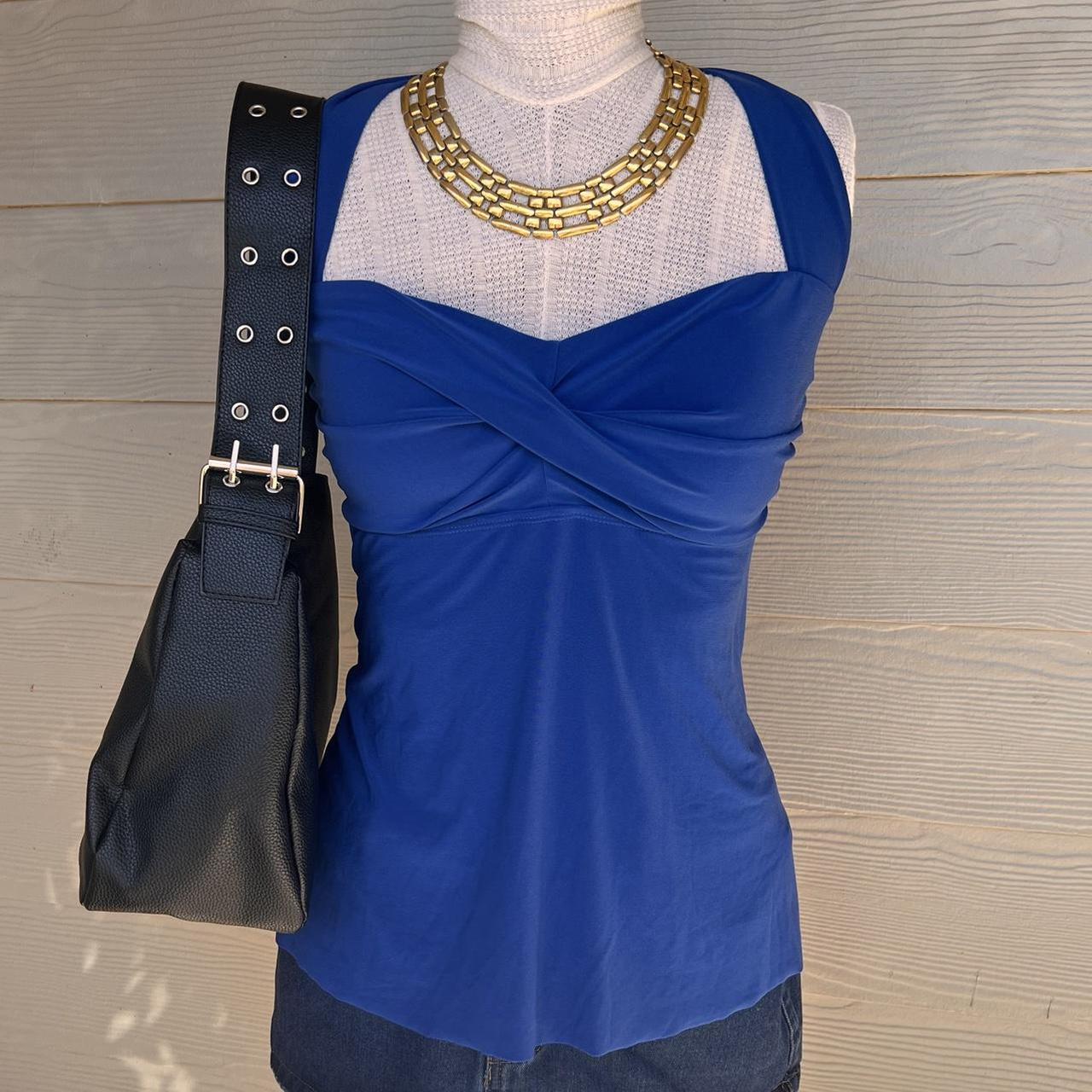 -blue halter top with padded criss cross front &... - Depop