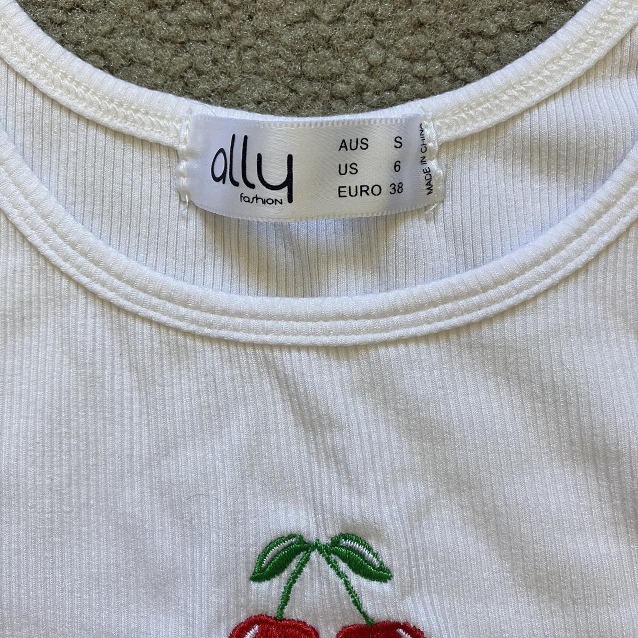 White cherry tank top from Ally, super stretchy and... - Depop