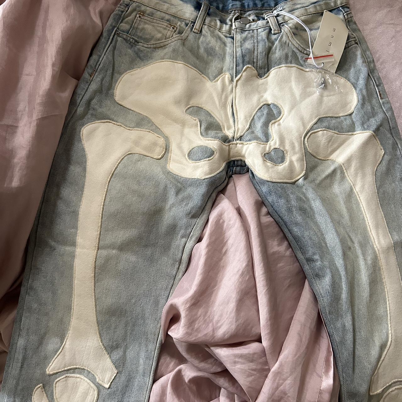 Brand new unworn MNML skeleton jeans light wash - Depop