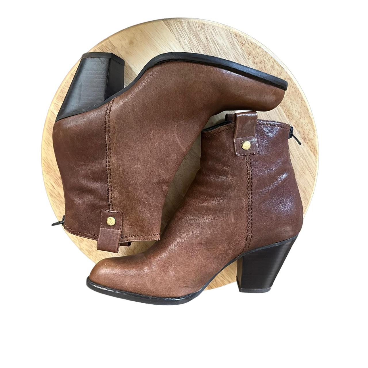 The Stuart Weitzman Hipgal ankle bootie pairs side... - Depop