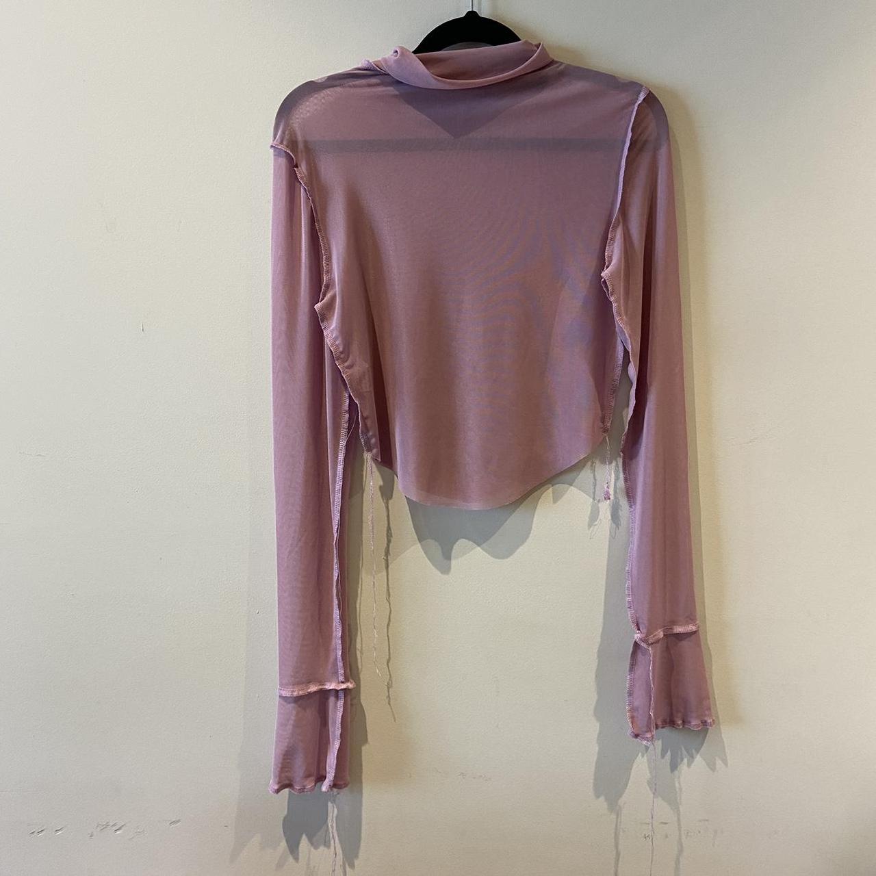 Pink mesh overlocked top! Great condition. Soft... - Depop