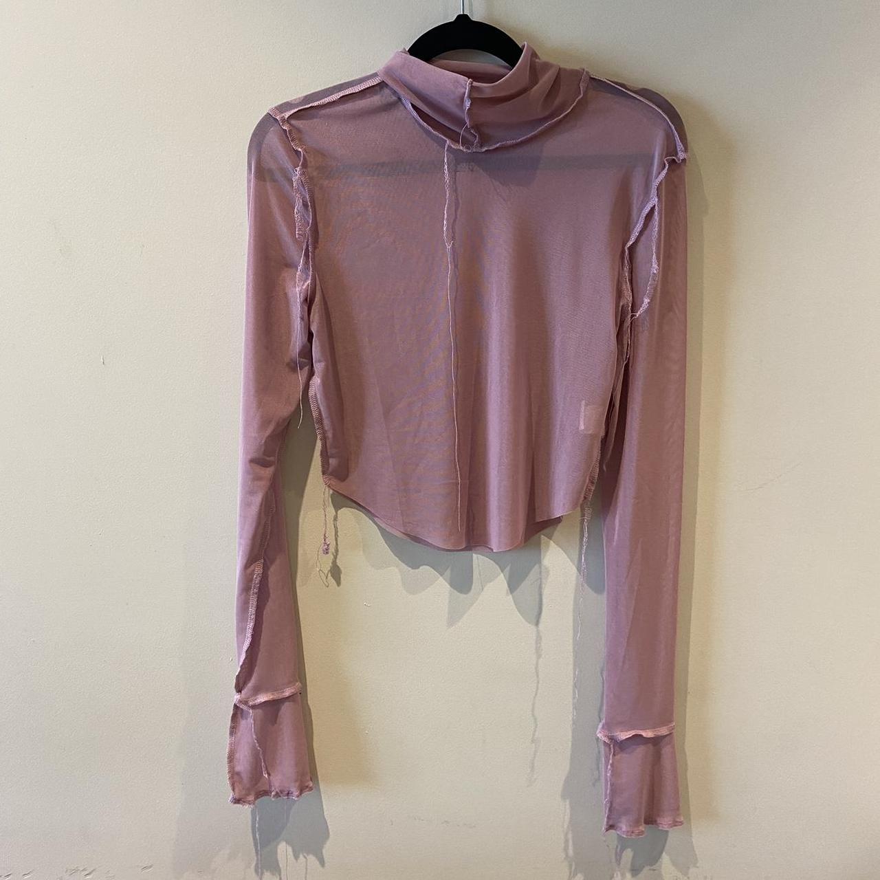 Pink mesh overlocked top! Great condition. Soft... - Depop