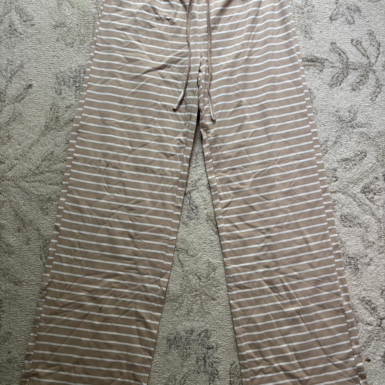tan and white Edikted striped pants, size medium.... | Depop