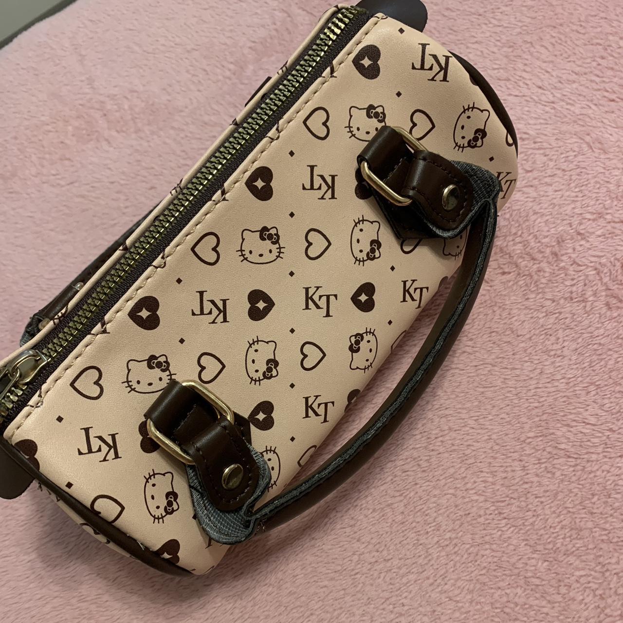 Small Hello Kitty hand/ shoulder cylinder purse... - Depop