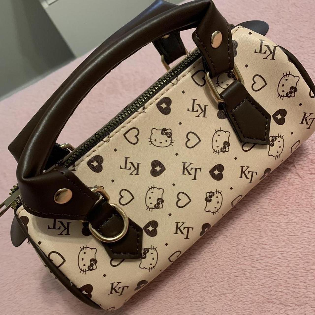 Small Hello Kitty hand/ shoulder cylinder purse... - Depop