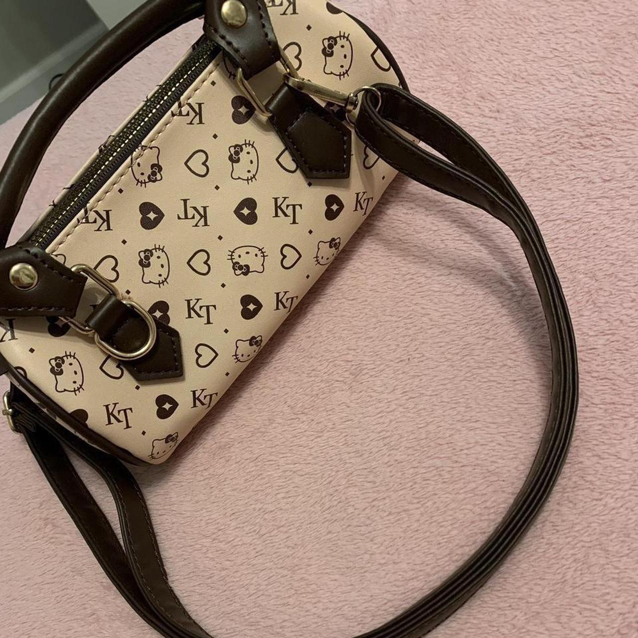 Small Hello Kitty hand/ shoulder cylinder purse... - Depop