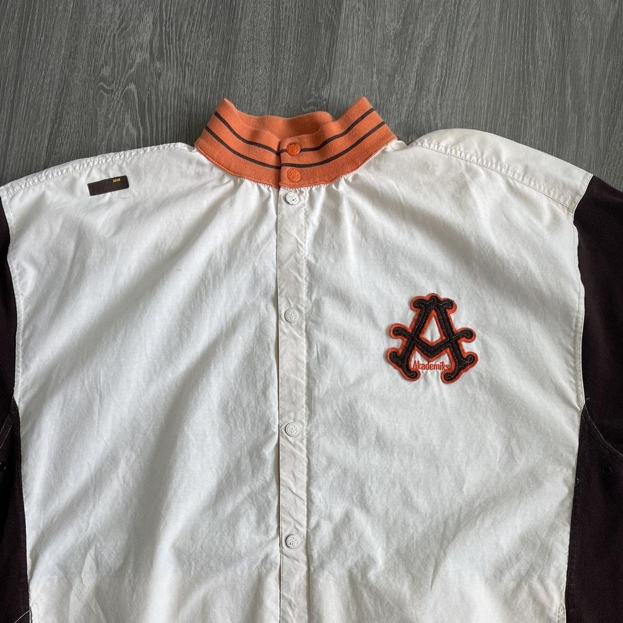 Akademiks Stadium Division Button Up Pit to pit:... - Depop