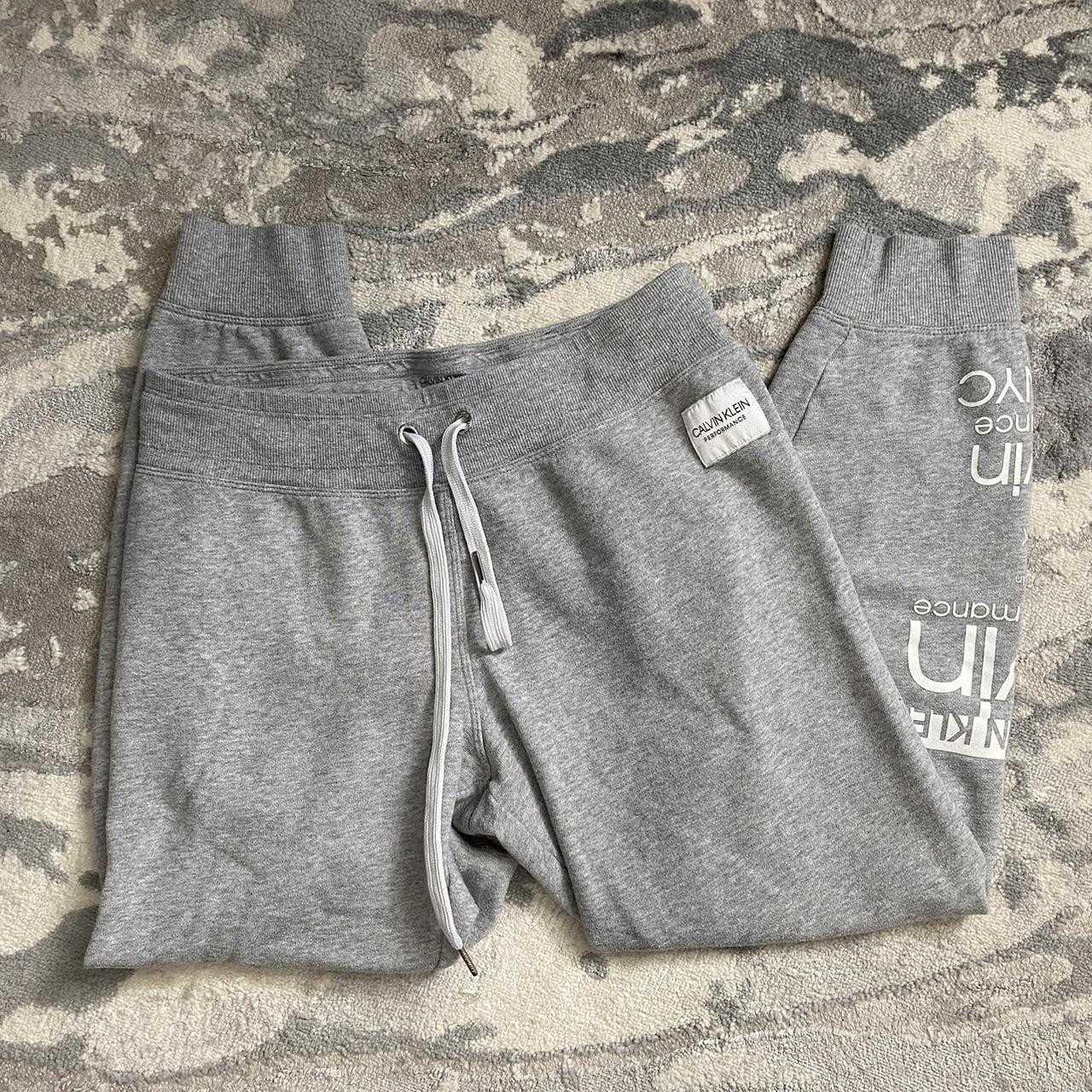 Calvin Klein grey sweatpants size M but fit smaller - Depop