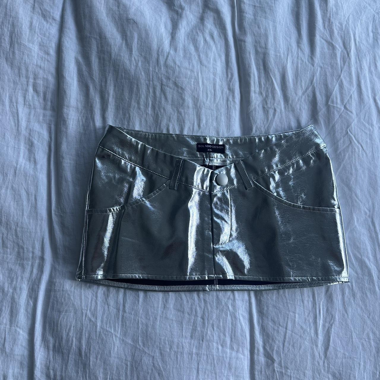 Silver metallic mini skirt. Brand new. Got it for a... - Depop