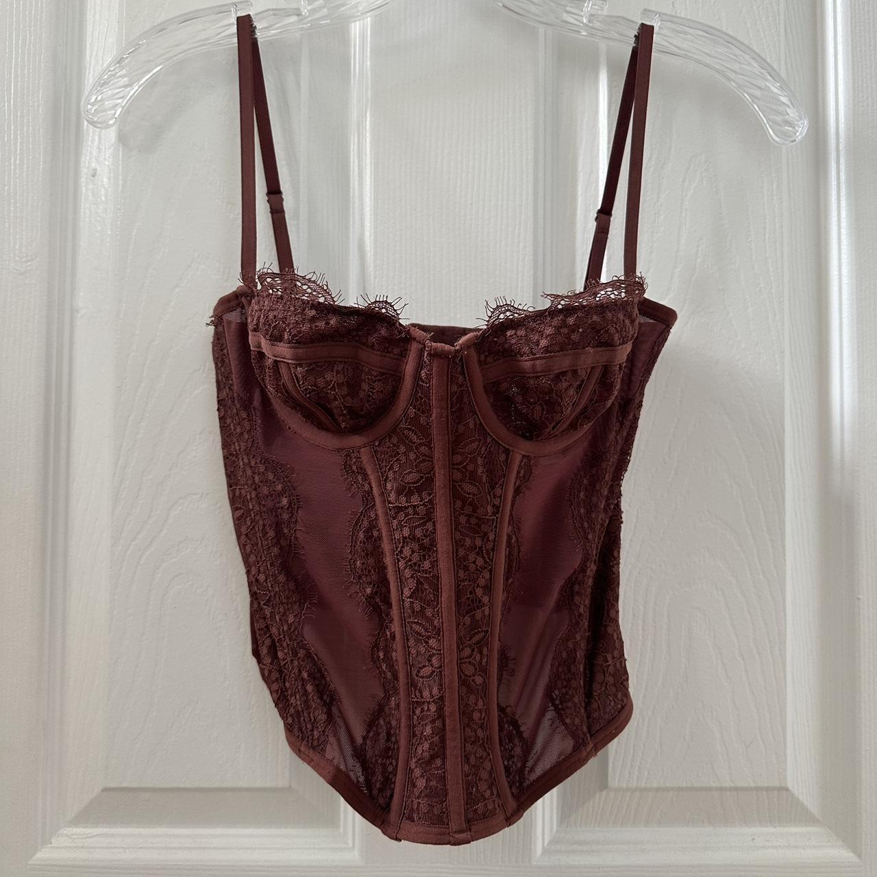 Small brown urban corset, well loved, incredibly... - Depop