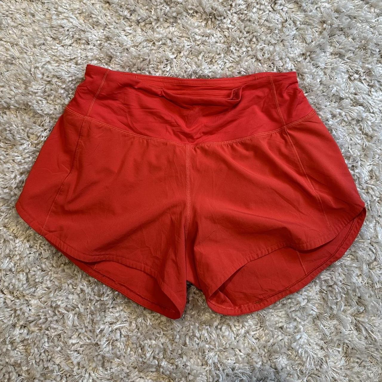 Coral colored lulu lemon shorts - Depop