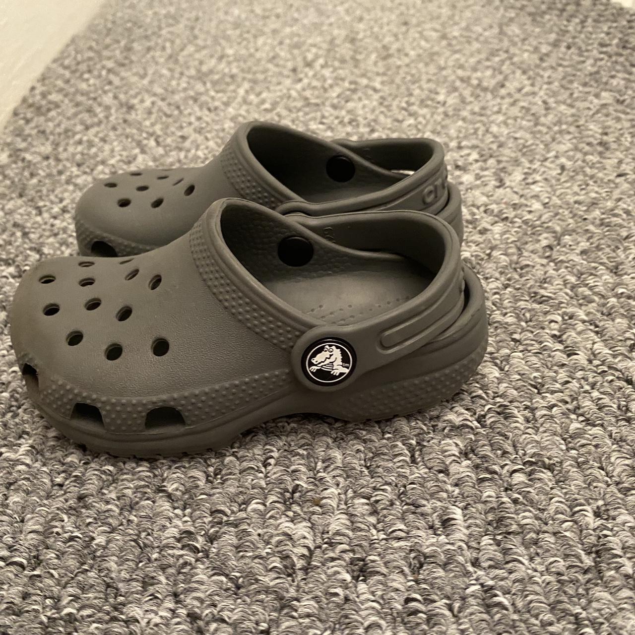 Grey infant crocs. Uk size 8 - Depop