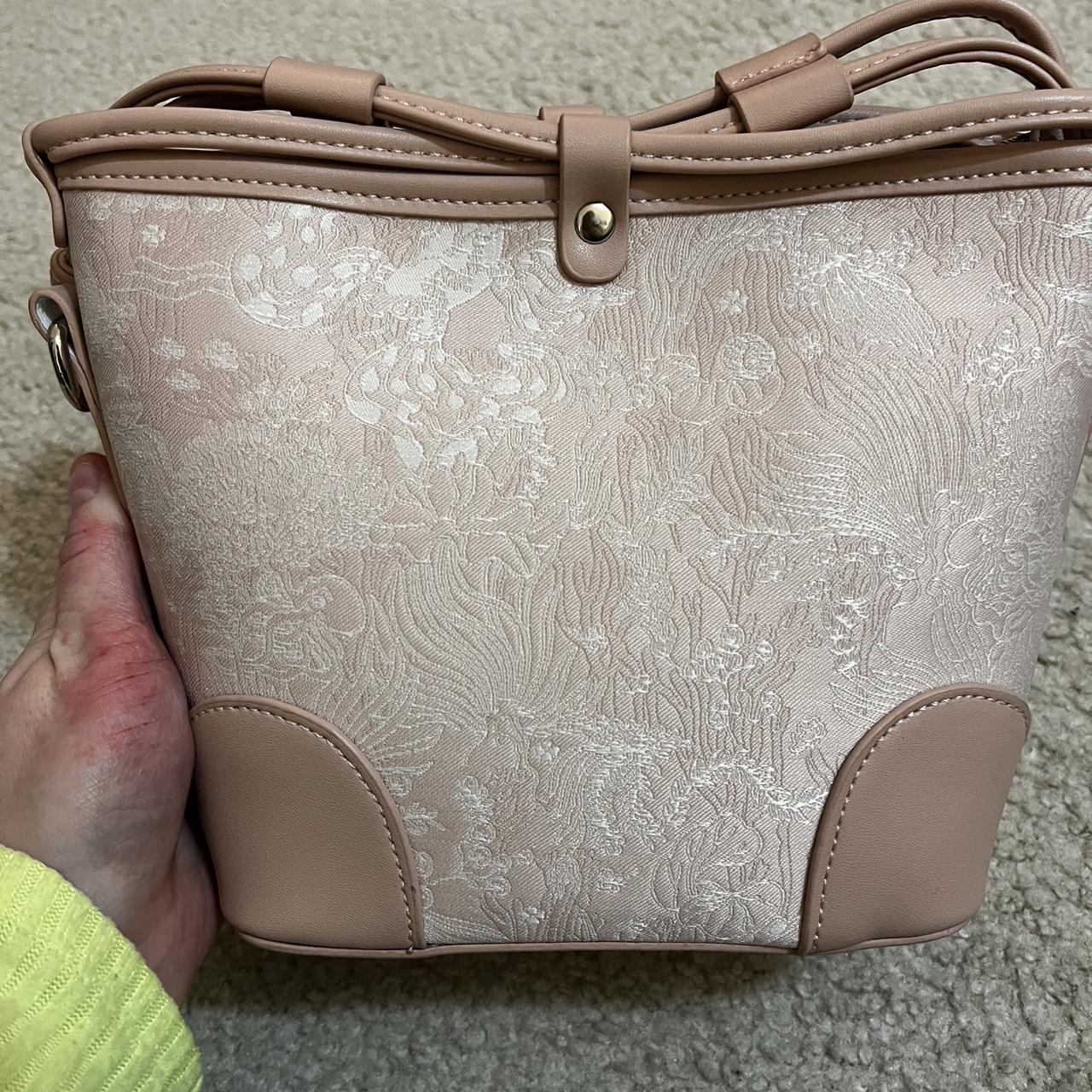 Small light pink bucket bag crossbody with silver... - Depop