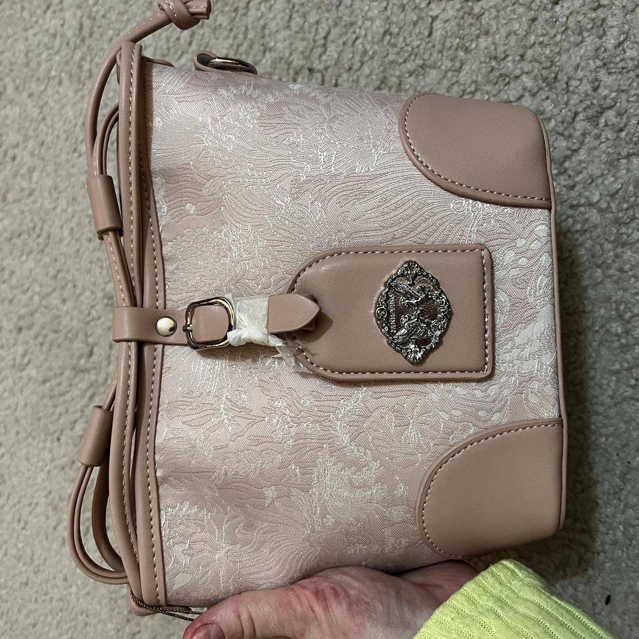 Small light pink bucket bag crossbody with silver... - Depop