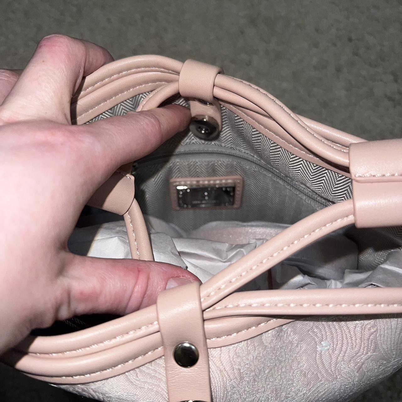 Small light pink bucket bag crossbody with silver... - Depop