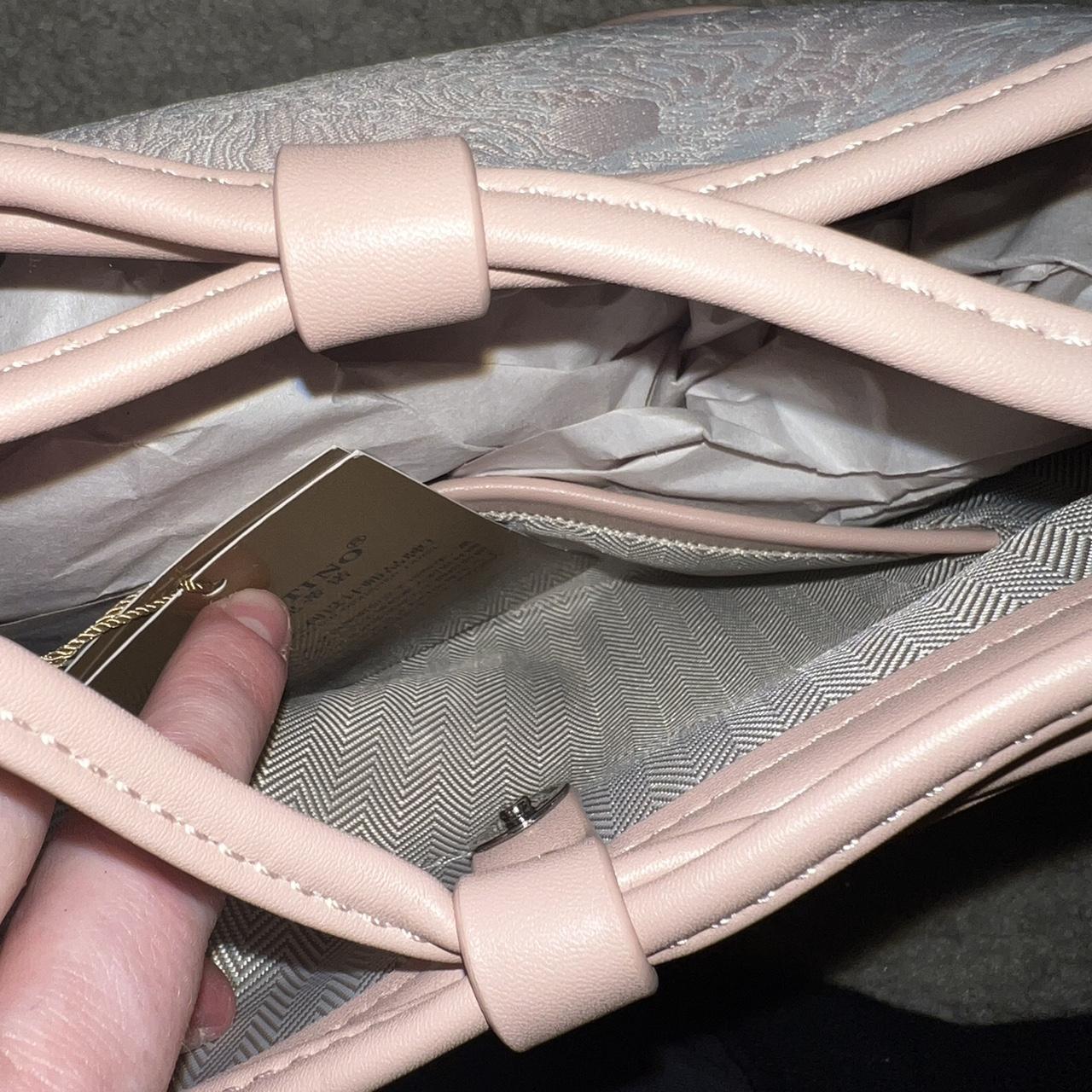 Small light pink bucket bag crossbody with silver... - Depop