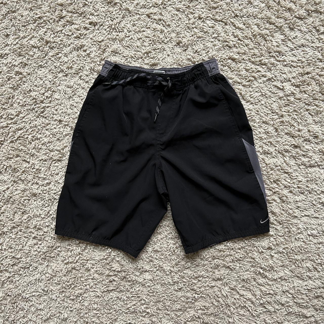 Swim trunks with elastic waistband and netted... - Depop