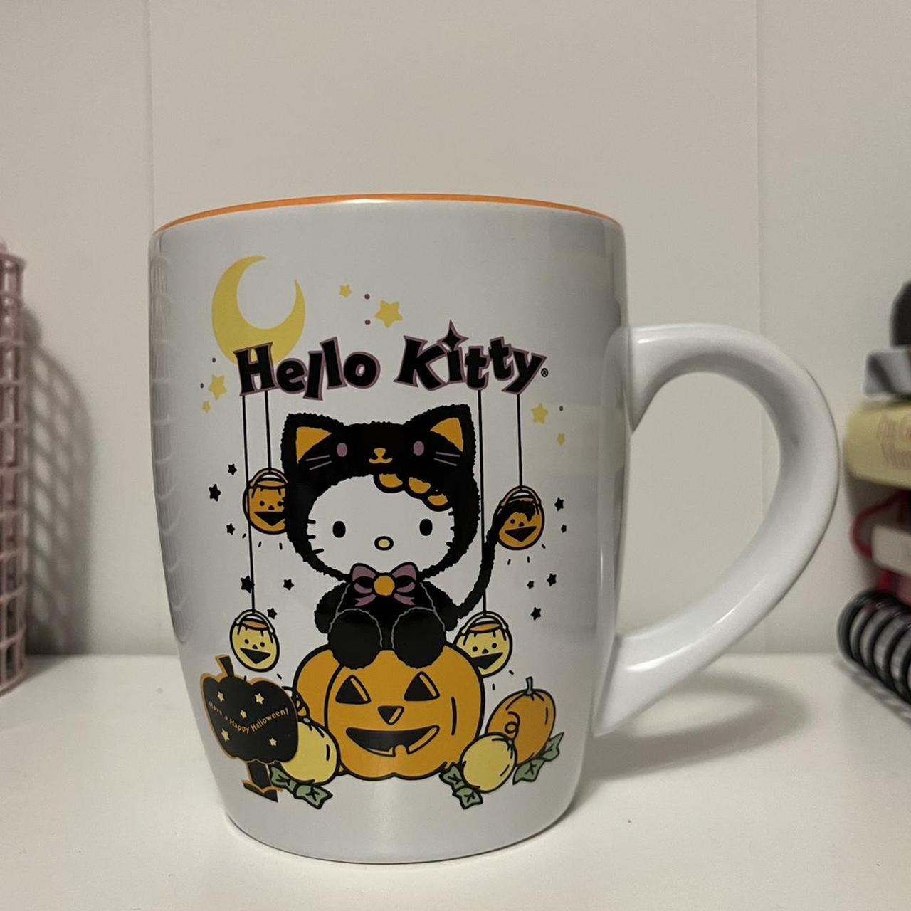 THE HALLOWEEN HELLO KITTY MUG AHHHH !! IT IS THE... - Depop