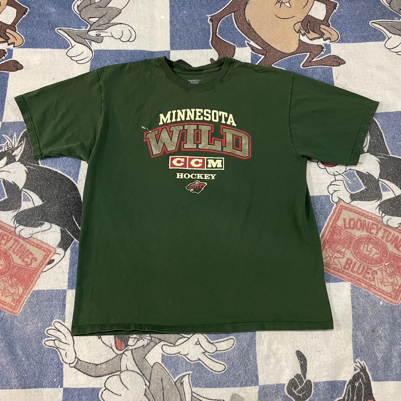 Y2k Minnesota wild tee size XL Nice fade Two small... - Depop