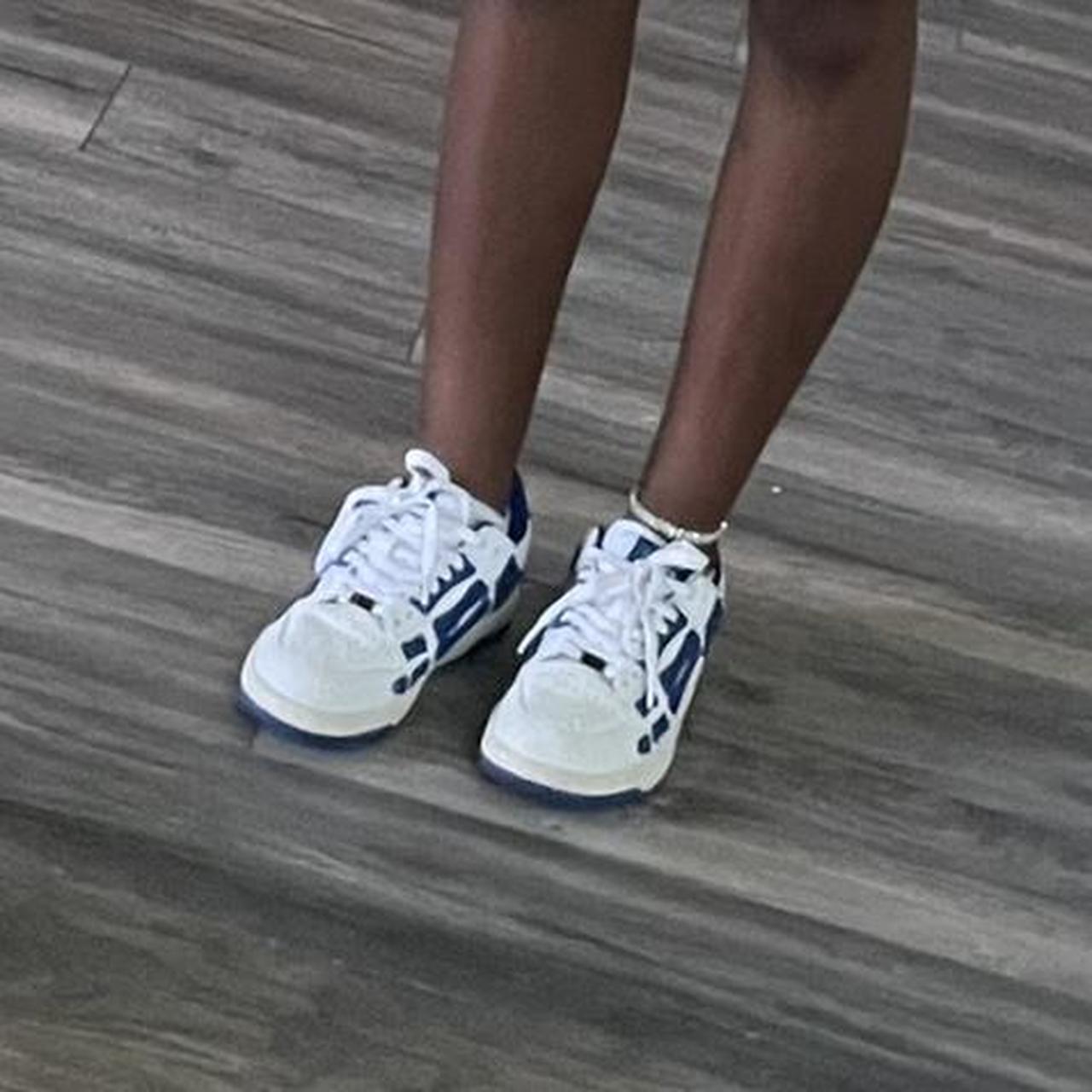 amiris low white and blue trainers, only worn twice,... - Depop