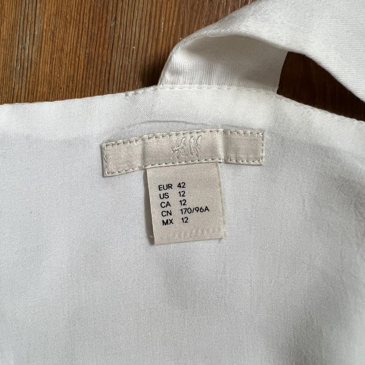 Off-white playsuit with straps and tie waist. H&M UK... - Depop