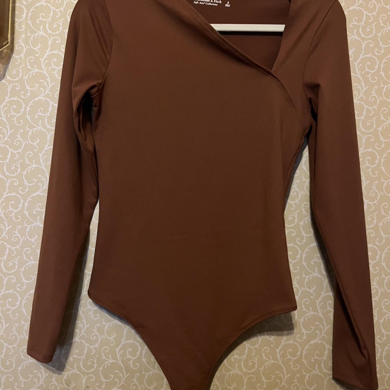 Abercrombie and fitch brown body suit. Asymmetrical... - Depop