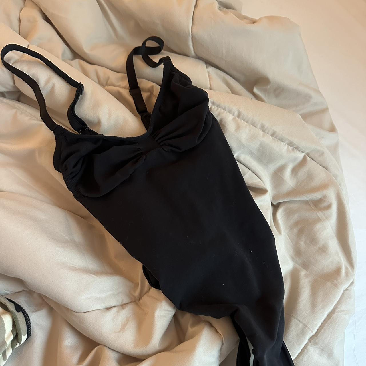 Skims thong bodysuit Black size small | Depop