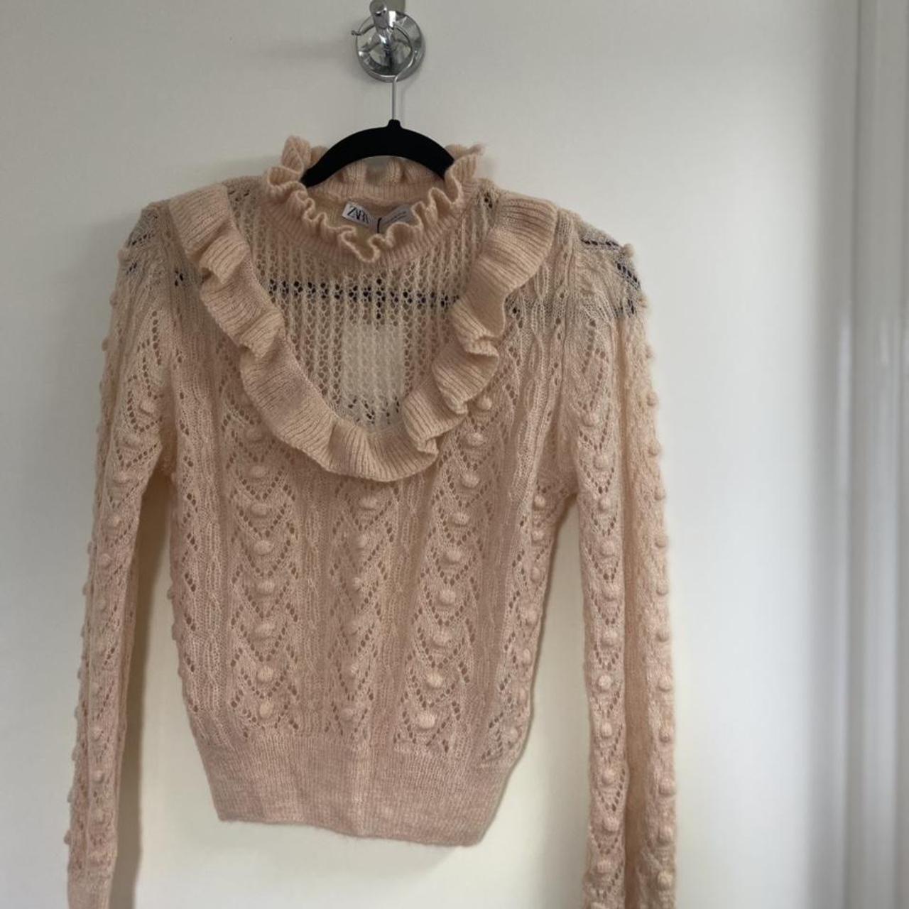Peach colour jumper with ruffle front and neck in... - Depop