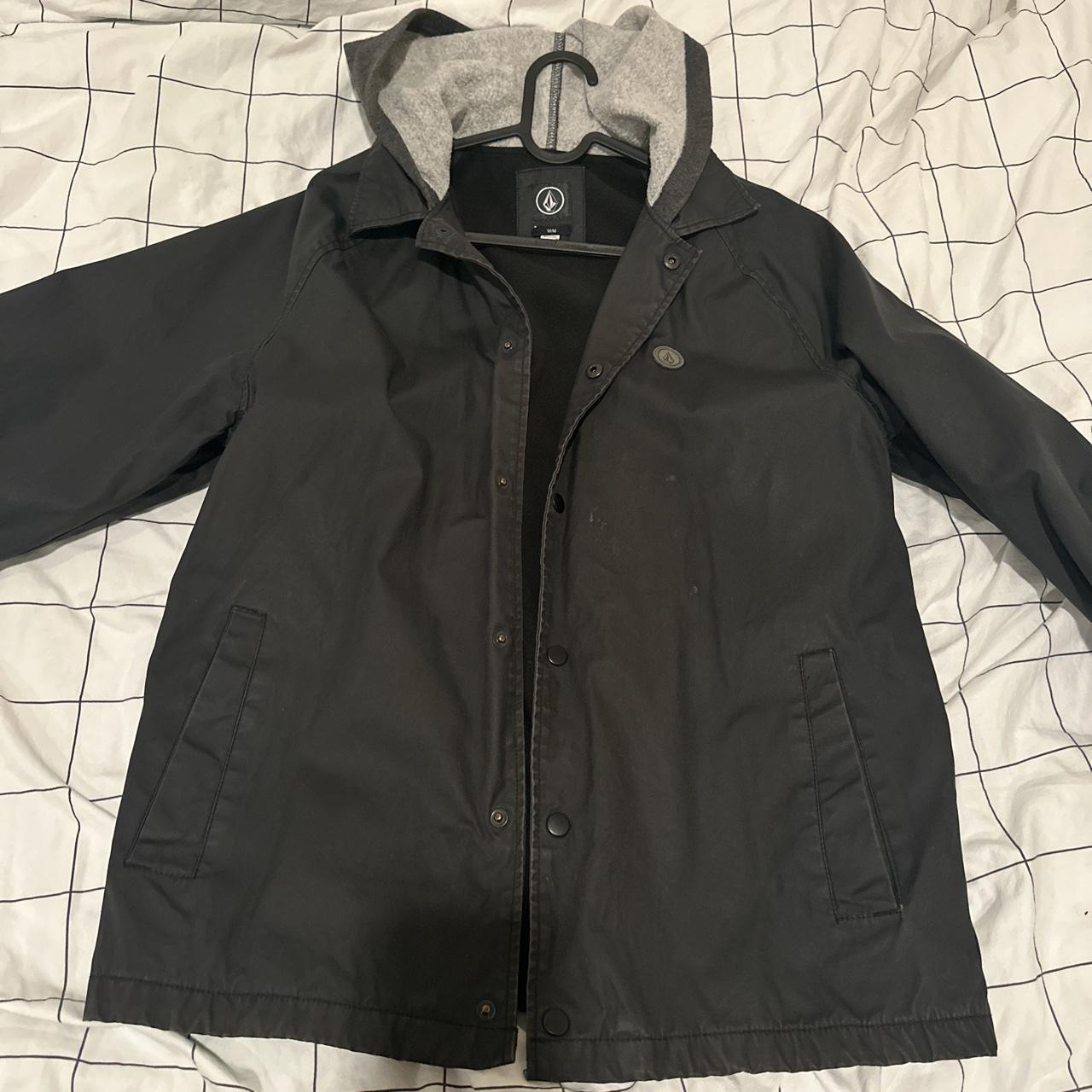 volcom hooded dark grey windbreaker . small stain in... - Depop