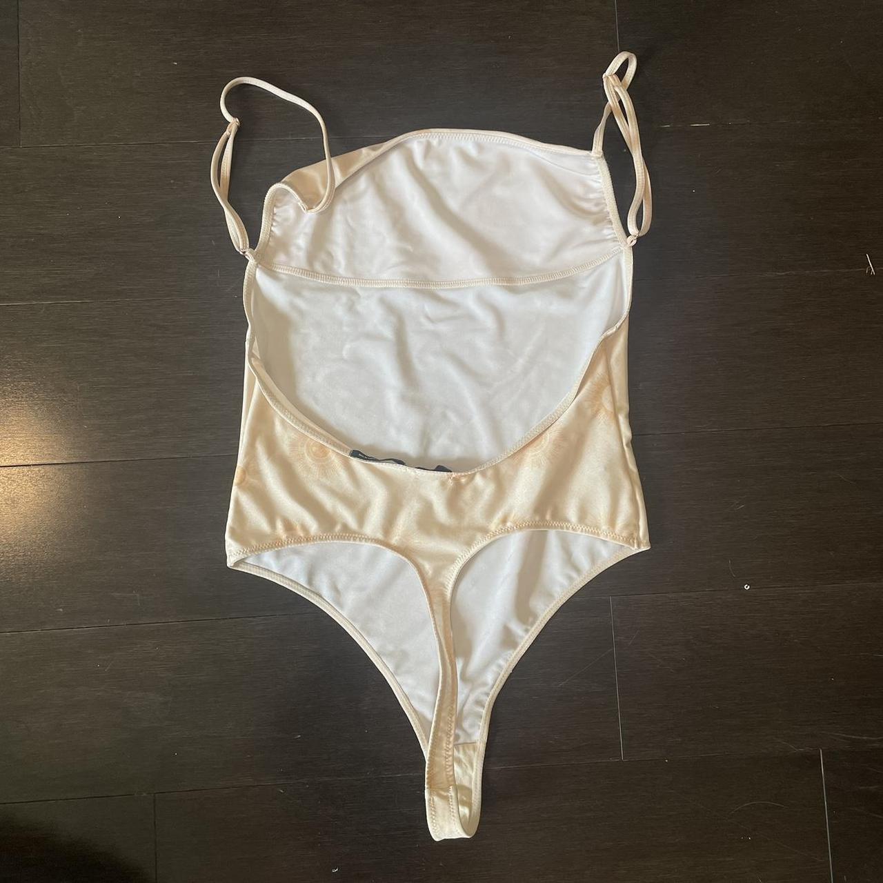 adorable celestial backless body suit bought from... - Depop