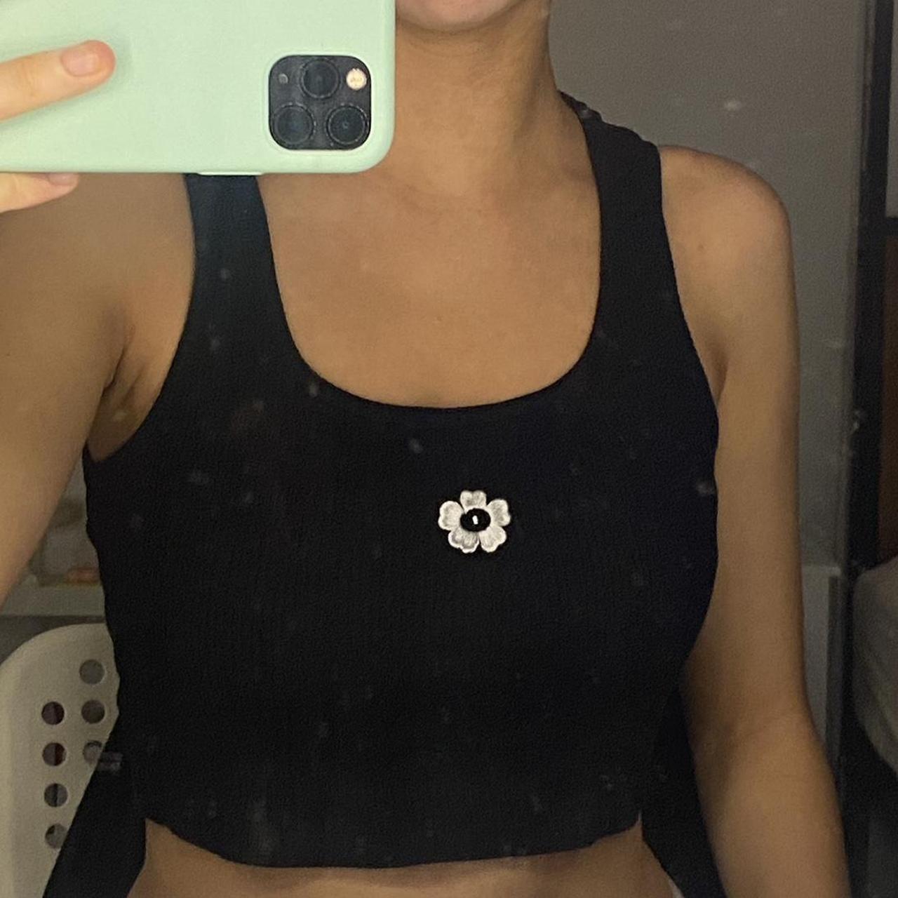 Ghanda tank top 🖤 Cute little flower on the front... - Depop