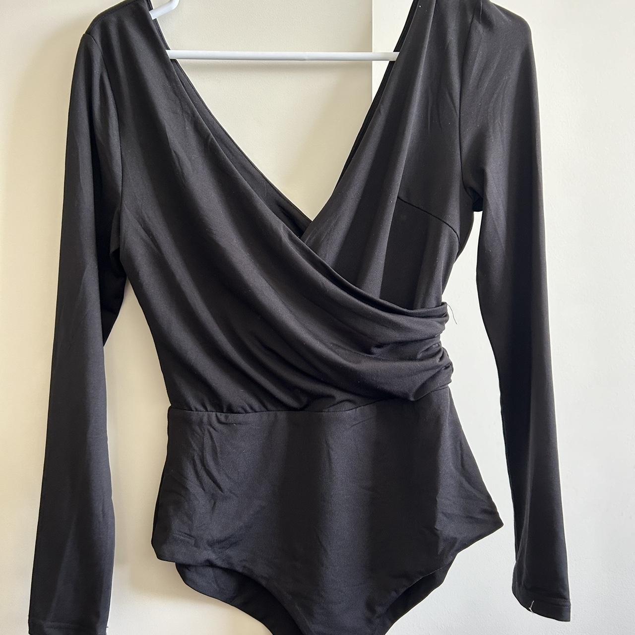 Black body suit with V line. Really flattering. Only... - Depop