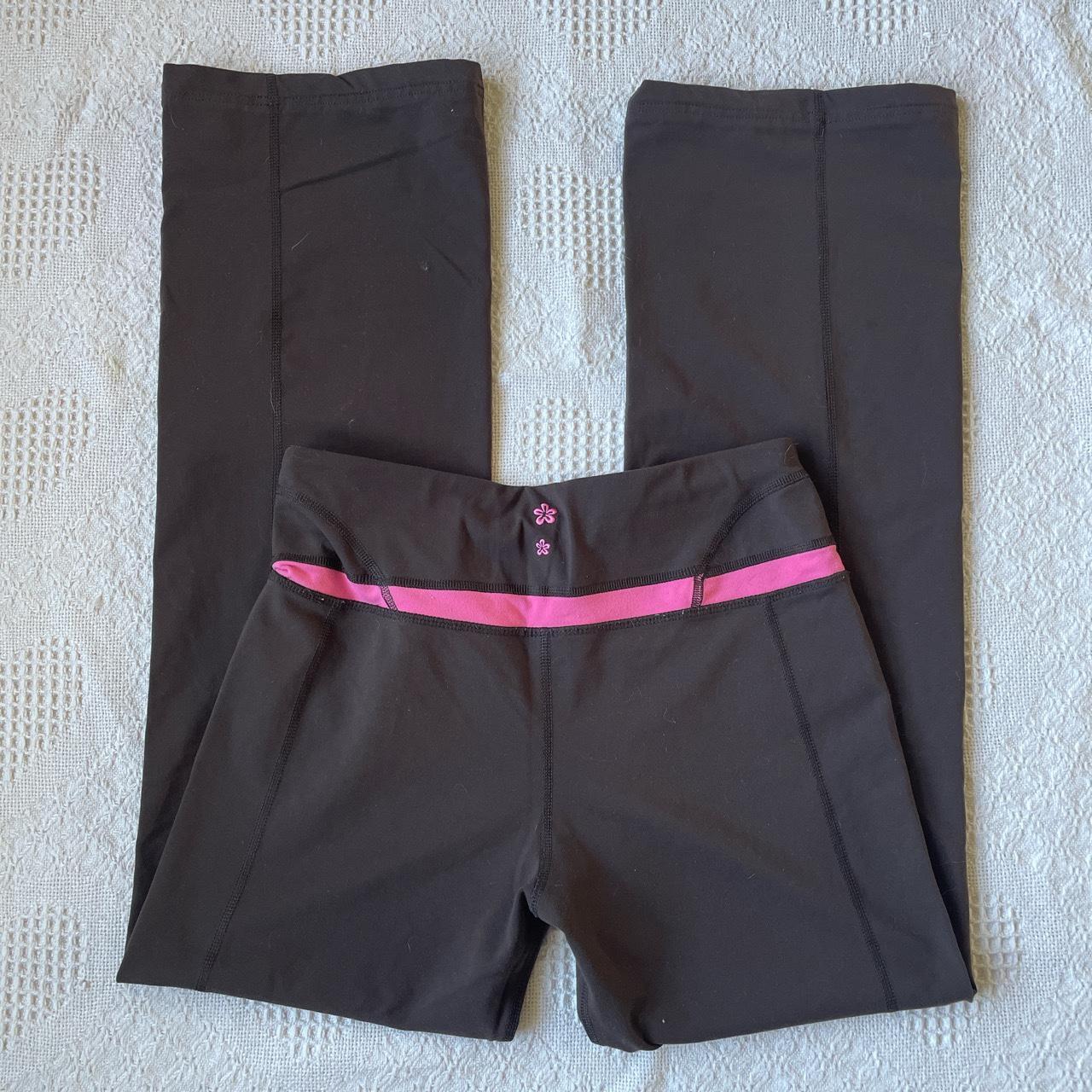 Cute brown mid rise yoga pants with a pink Burst of... - Depop