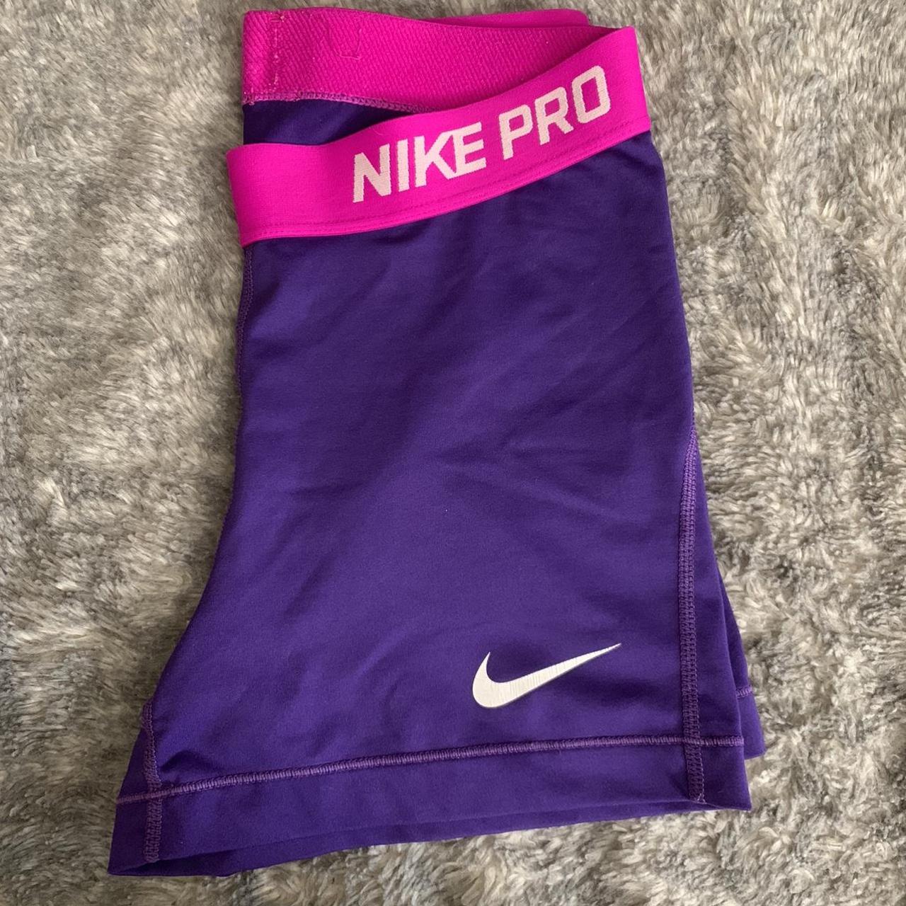 nike pro purple and pink shorts size says M but... - Depop