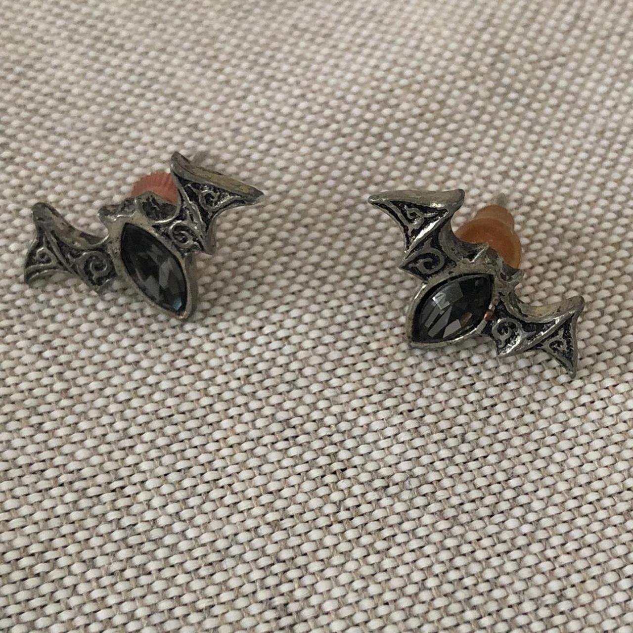 Alchemy gothic bat stud earrings. Clear backs are... - Depop